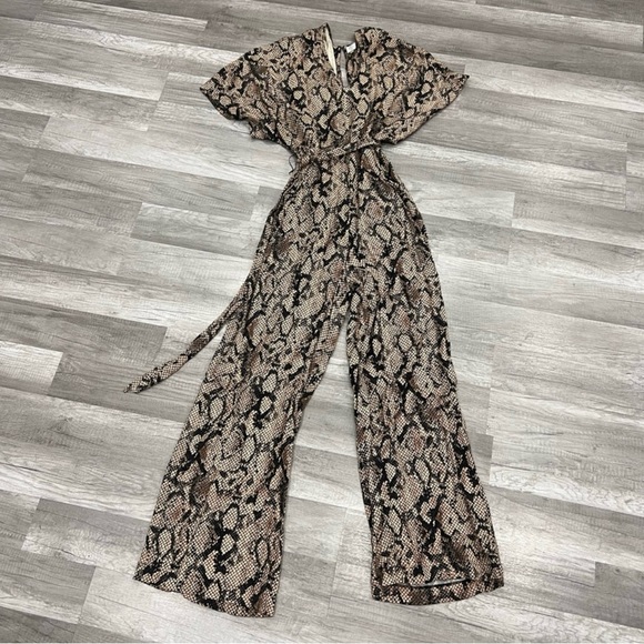 Anthropologie | Pants & Jumpsuits | Snake Skin Jumpsuit | Poshmark